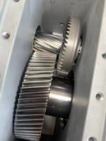 China KM63 50:1 Ratio 90 Degree Angle Hypoid Helical Bevel Hollow Shaft Gearbox for sale
