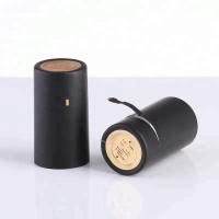 China PVC Tear Tape Wine Bottle Heat Shrink Capsule 30mm Embossed Logo Sealing Cover for sale