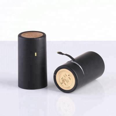 China PVC Tear Tape Wine Bottle Heat Shrink Capsule 30mm Embossed Logo Sealing Cover for sale