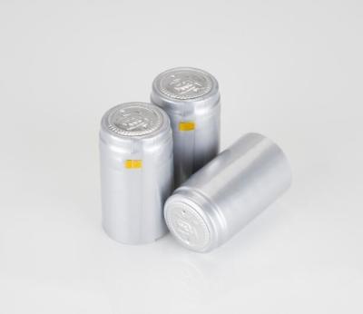 China Anti Slip Embossed Heat Shrink Wine Bottle Seals 23mm to 35mm Diameter PVC Caps for sale