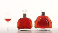 China 500ml 750ml Raised Bottom Glass Wine Bottle with Cork Lid and Screw Cap for sale
