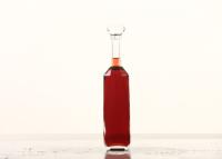China Custom 200ml to 1000ml Transparent Flint Glass Liquor Wine Bottle with Aluminum Screw Cap for sale