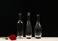 China Custom 200ml to 1000ml Transparent Round Flint Glass Liquor Bottle for Whisky Vodka Tequila for sale