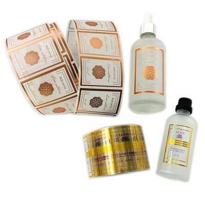 China Custom Waterproof Vinyl Logo Stickers Roll 1000pcs Self Adhesive Bottle Packaging Labels for sale
