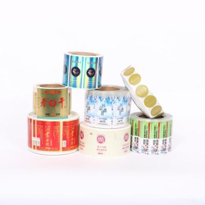 China Custom Round Waterproof Synthetic Paper Bottle Label Sticker Roll 80m High Speed Printing for sale