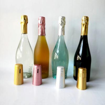 China Custom Embossed Aluminum Foil Champagne Capsule Gold Color Wine Foil Capsule 10000pcs MOQ for sale