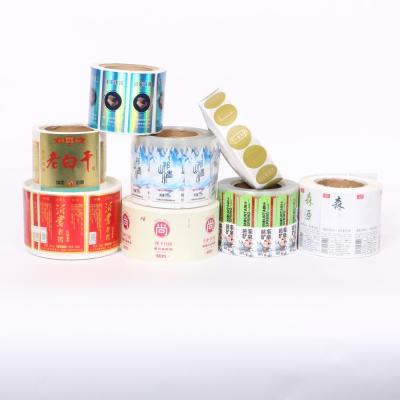 China Custom Waterproof Synthetic Paper Round Logo Sticker Label Printing Roll 100000 pcs for sale