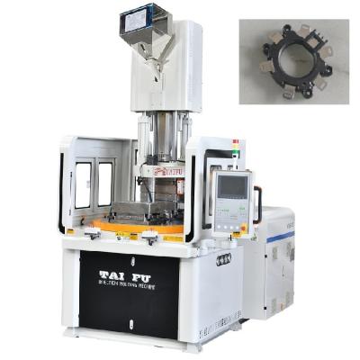China Horn Contact Retainer Making Machine Vertical Rotary Table Injection Molding Machine for sale