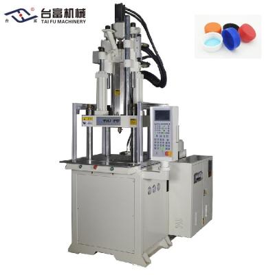 China High Precision Vertical Plastic Product Injection Molding Machine For Making Bottle Cap for sale
