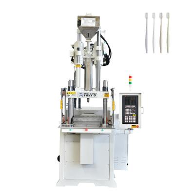 China 55 Ton Single Slide Vertical Injection Molding Machine For Making Toothbrush for sale