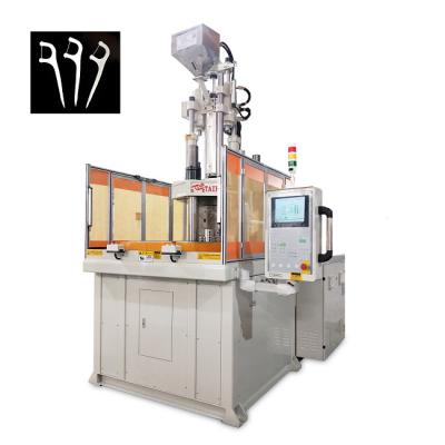 China 120 Ton Rotary Vertical Plastic Injection Molding Machine For Making Glasses Frame for sale