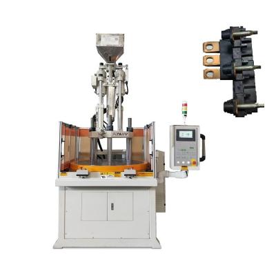 China Easy Operate Rotary Vertical Plastic Injection Molding Machine For Making  Automobile Parts for sale