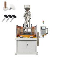 China Easy Operate Rotary Vertical Plastic Injection Molding Machine For Making Tack for sale