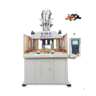China 120 Ton Two Color Vertical Injection Molding Machine For Making Gyroscope for sale