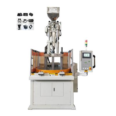 China High Efficiency Rotary Vertical Plastic Injection Molding Machine For Making Auto Parts for sale