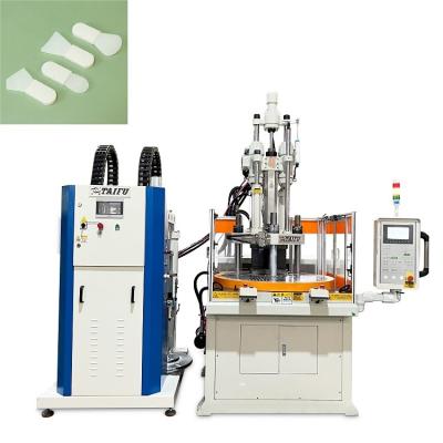 China 55 Ton Liquid Silicone Vertical Injection Molding Machine For Making Face Mask Brush for sale