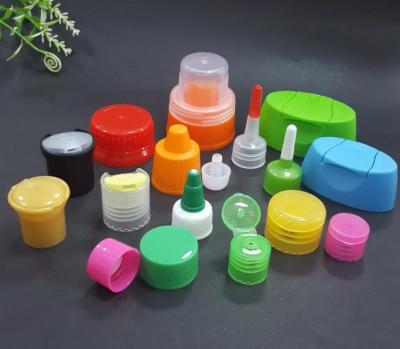 China Various Size Plastic Flip Top Caps Standard Private Label For Cosmetic Dispensing Bottle for sale