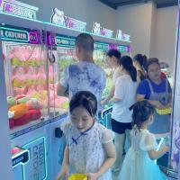 China Playfun neon catcher metal cabinet arcade toys grabber new crane claw game machine for sale