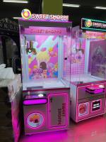 China Sweet Candy Claw Crane Coin Operated Arcade Game Machine for sale