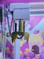 China Sweet Candy Claw Crane Coin Operated Arcade Game Machine for sale