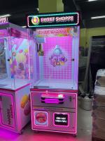 China Sweet Candy Claw Crane Coin Operated Arcade Game Machine for sale