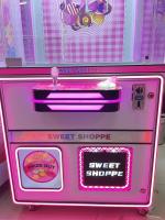China Sweet Candy Claw Crane Coin Operated Arcade Game Machine for sale
