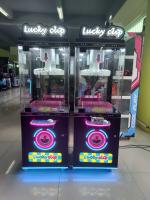 China Brazil popular arcade mini prize 24 clips coin operated vending game machine for sale