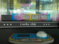 China Brazil popular arcade mini prize 24 clips coin operated vending game machine for sale