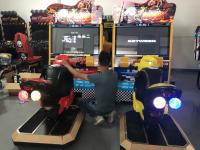 China Indoor Playground Commercial Game Park India   32 LED Maxx  TT Single  Twin  Bike  Driving   Machine  Car Racing Game Simulator for sale