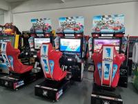 China Indoor Playground Commercial Game Park India   32 LED Maxx  TT Single  Twin  Bike  Driving   Machine  Car Racing Game Simulator for sale