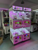 China Hot Sale Probability Controllable Amusement 2 in 1 Lucky Nine Mini 24 Clip Prize Clamp and Capsule Ball Gift Game Machine for sale
