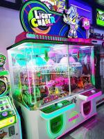 China Coin Operated Amusement Park Kids Vending Game Dim Lighter Chaser Toys Dolls Snacks Prize  Game Machine for sale