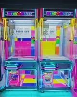 China Factory Price Wholesale Kids Transparent Claw Machine with Lucky Gift Box Plush Toy Crane Game for sale