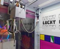 China Factory Price Wholesale Kids Transparent Claw Machine with Lucky Gift Box Plush Toy Crane Game for sale