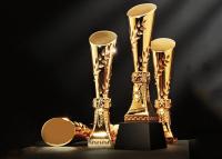 China Gold Plated Polyresin Trophy Cylinder Shape Year - End Bonus For Enterprise Staff for sale
