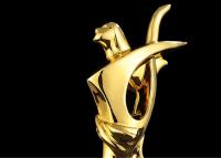 China Poly Resin Material Award Cups Trophies With Abstract Figure Design for sale