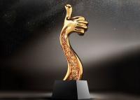 China Resin Material Trophies For School Awards , Thumb Shape Award Cups Trophies for sale