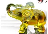 China Amber Colored Glaze Indoor Home Decoration Elephants Figurine Statue 135*80*115mm for sale