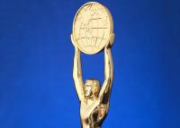 China Engraved Custom Metal Trophies Man Figure Holding World Map By 3D Printing for sale