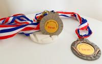 China Ribbon 3D Design Service Zinc Alloy Engraved Sports Medals for sale
