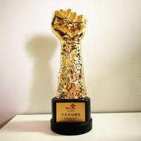 China Souvenir gift Golden polyresin Fist Trophy Company Staff Awards for sale