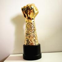 China Souvenir gift Golden polyresin Fist Trophy Company Staff Awards for sale
