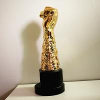 China Souvenir gift Golden polyresin Fist Trophy Company Staff Awards for sale