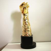 China Souvenir gift Golden polyresin Fist Trophy Company Staff Awards for sale