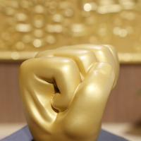 China Boxing Match Award Golden Fist 9cm Resin Trophy Cup office decoration for sale