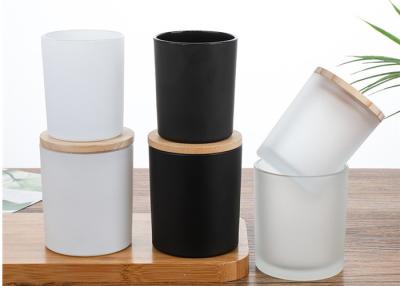 China Glossy Black Cylinder Glass Candle Vessel Glass Candle Jar with Flat Bottom for sale