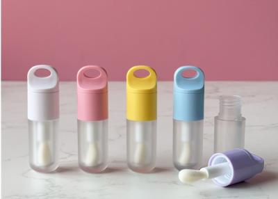 China Scrub Bottle Flat Cap 5ml Round Lip Oil Bottle Cosmetic Lip Gloss Tube Packaging With Large Brush for sale