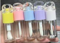 China Keychain Hole Shape Cap 4ml Thick Round Lip Gloss Rod Tube Unique Large Brush Lip Gloss Bottle Lip Gloss Container for sale