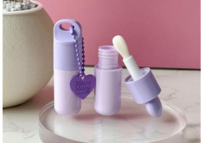 China 5ml Bubble Round Purple Lip Gloss Packaging Tube with Large Brush Plastic Tube Packaging for sale