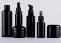 China Black Skin Care Packaging Cream Bottle Glass Skincare Packaging Cream Cosmetic Glass Jar and Lotion Bottle Set for sale